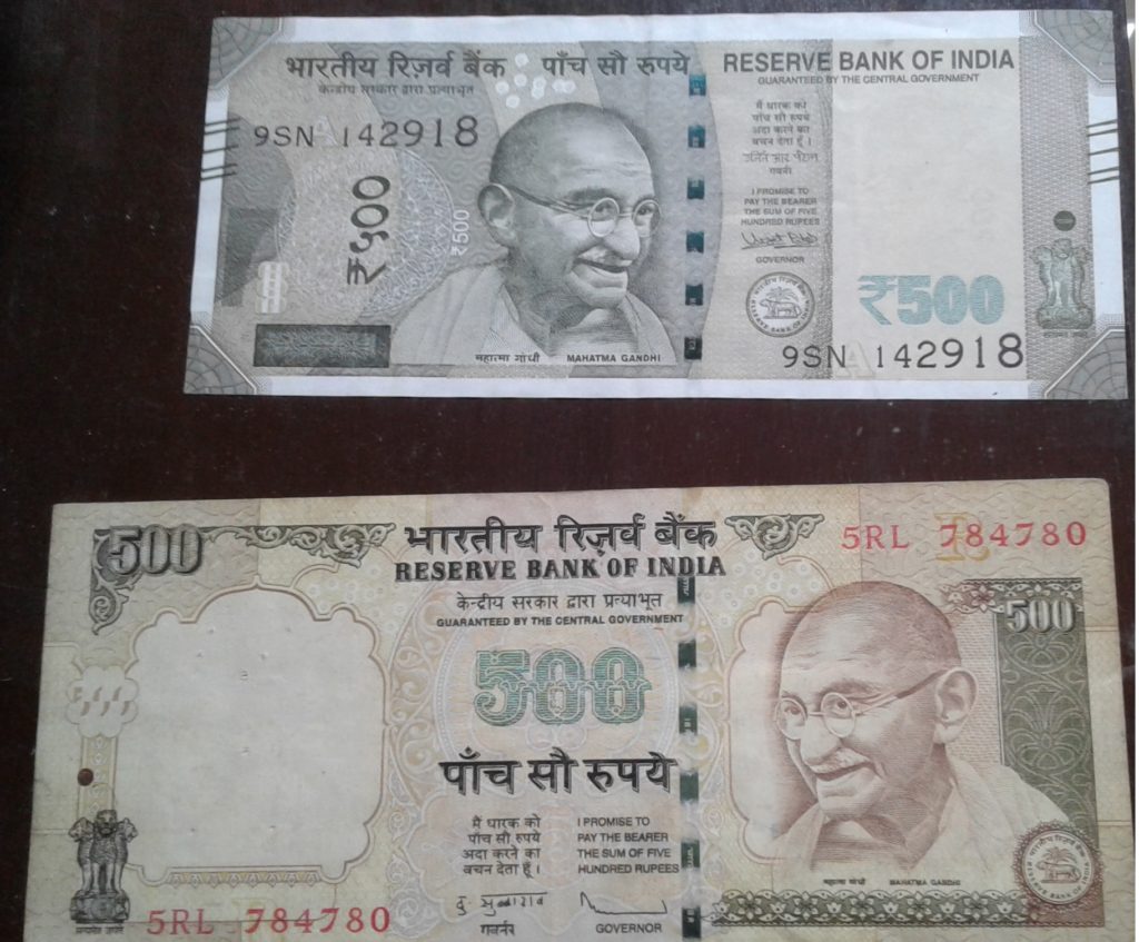 The new and old 500 rupee notes. Difference in size meant ATMs had to ...